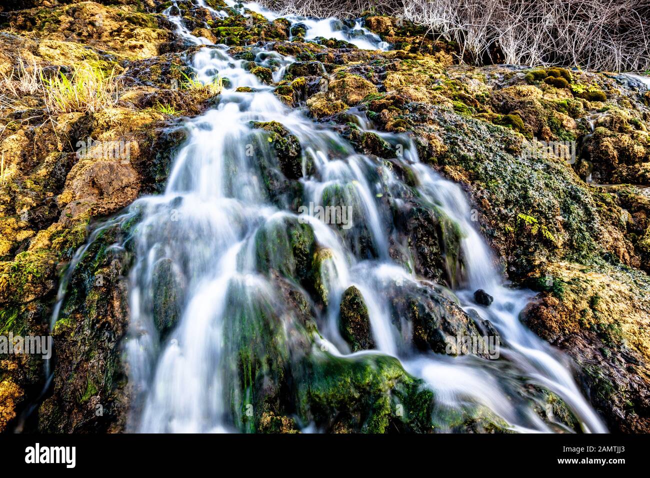 stone water channel full of running water in Tierra del Trigo village ...