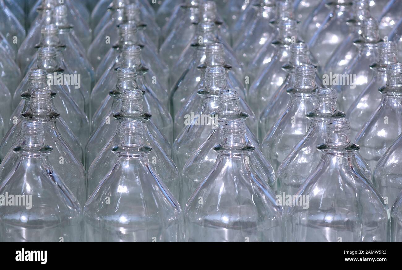 Rows of empty glass bottles with no caps Stock Photo - Alamy