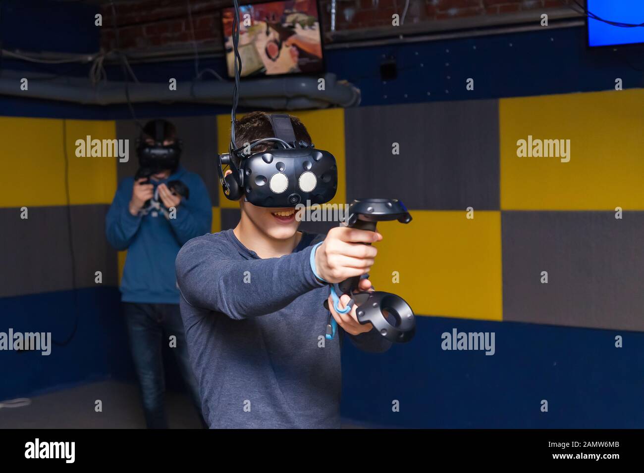 Two guys playing video games hi-res stock photography and images - Alamy