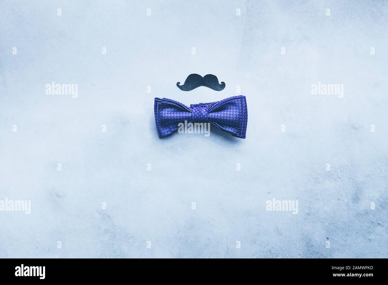 Men's tie butterfly black mustache photo props on a blue fashionable ...