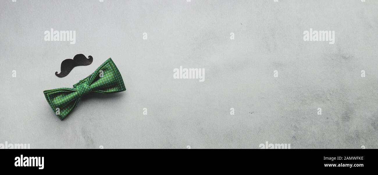 Men's tie butterfly black mustache photo props on a blue fashionable ...