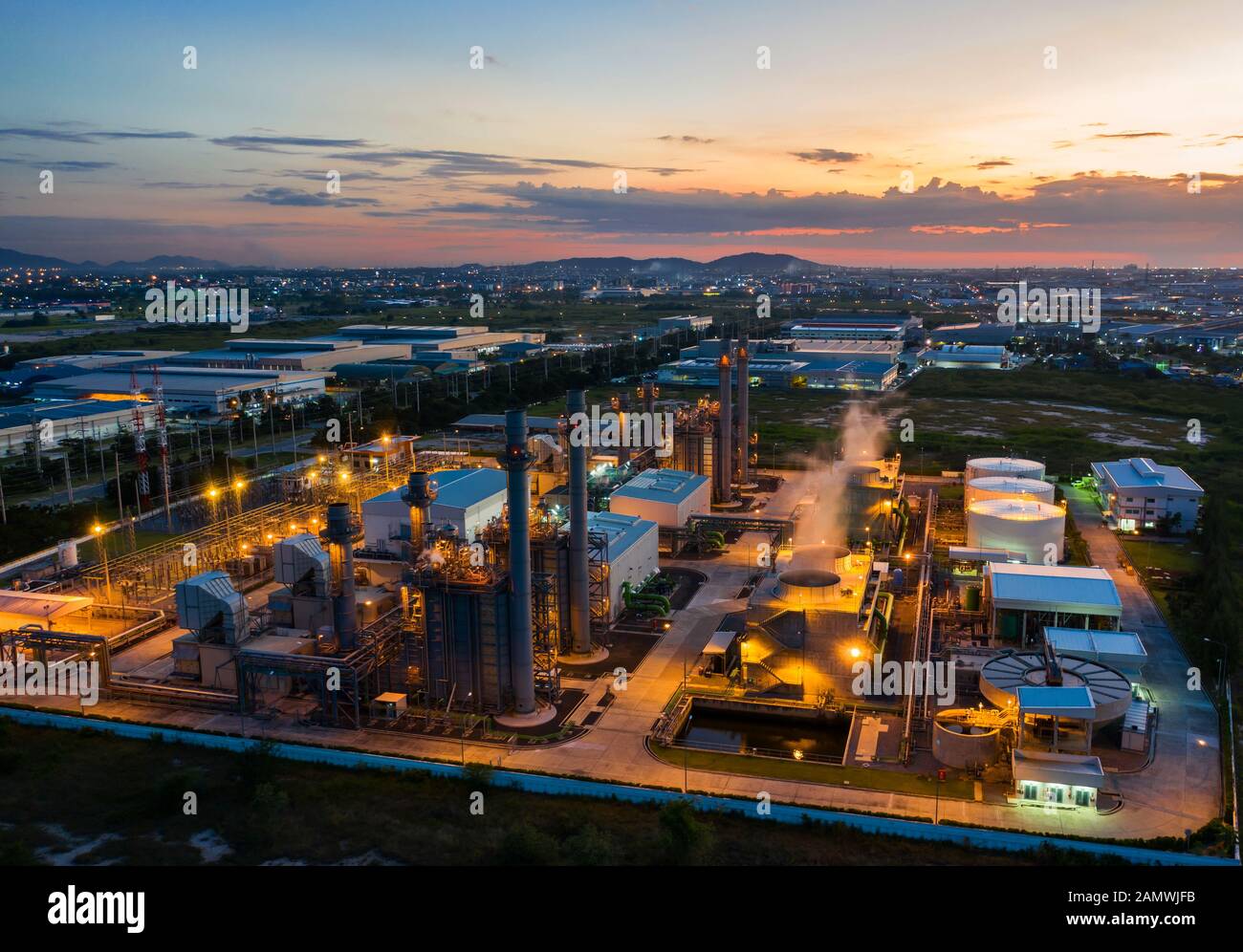 Aerial view night light oil terminal is industrial facility for storage ...