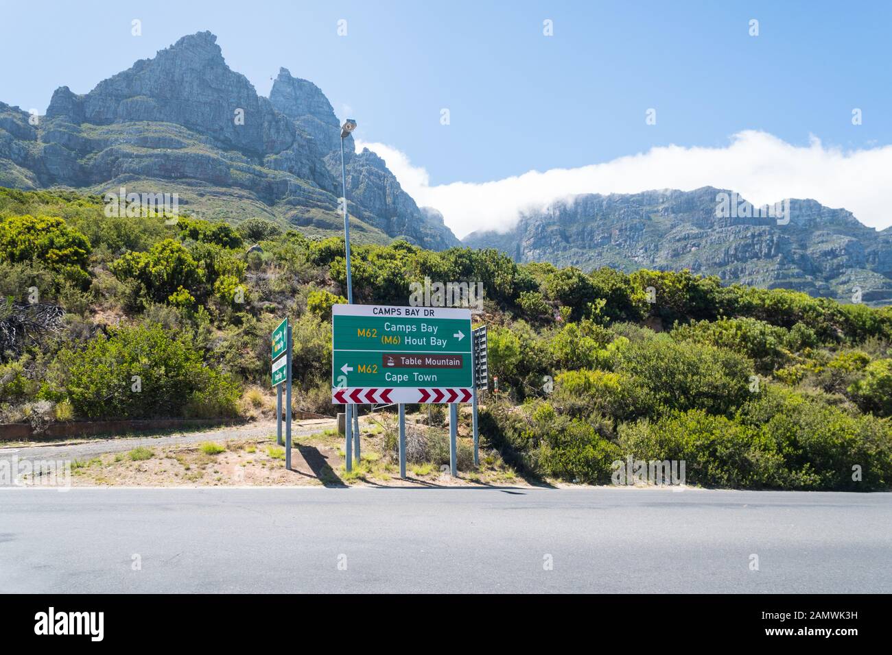 green road sign on M62 main road,Camps Bay Drive,showing directions to ...