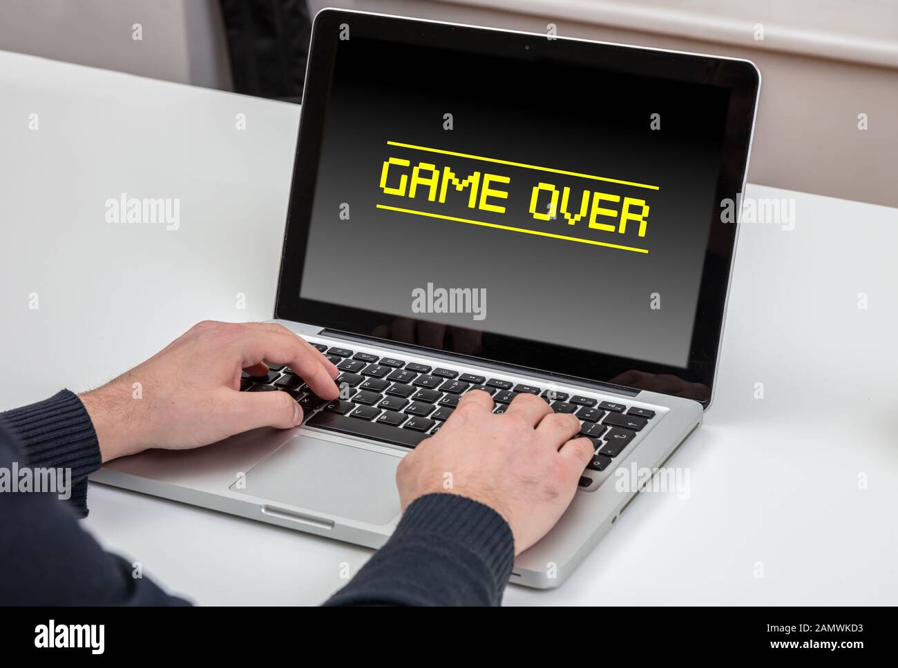 Game over, dismiss concept. Man working with a computer laptop, game ...