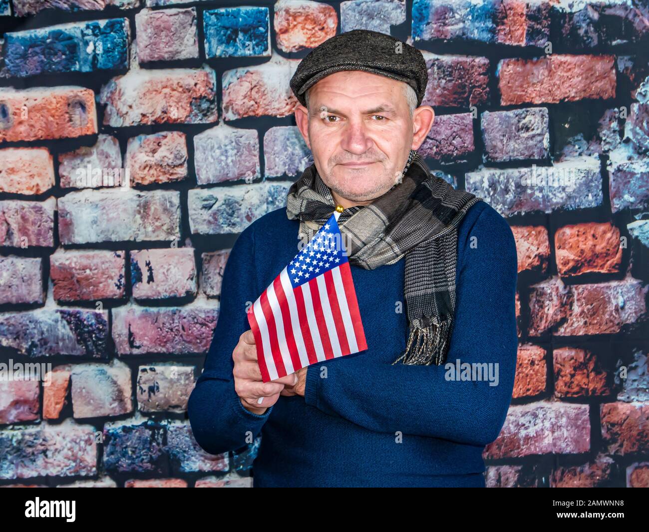 A man with an American flag in his hand on Independence Day ...