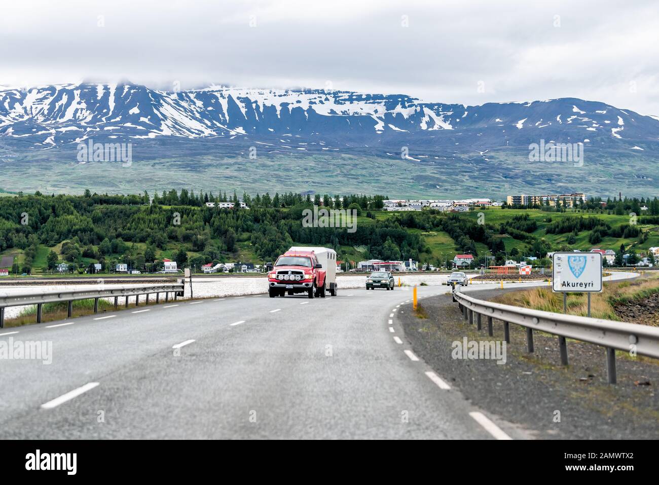 Akureyri, Iceland - June 16, 2018: Cityscape view on large town fishing ...