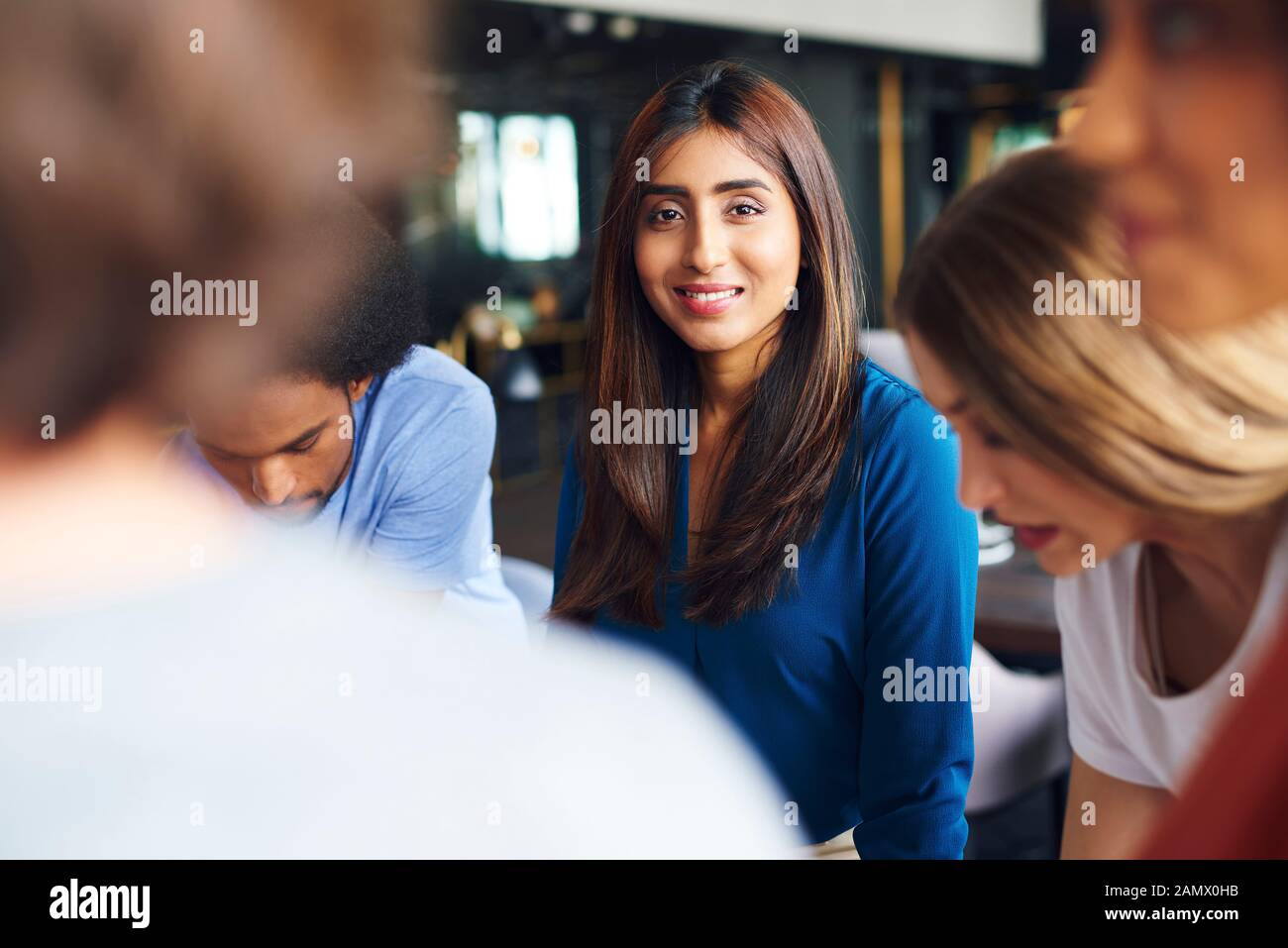 Portrait of beautiful Asian woman over work Stock Photo - Alamy