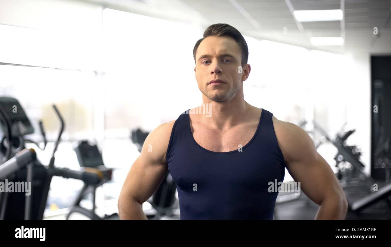 Handsome muscular man pointing healthy hi-res stock photography and ...