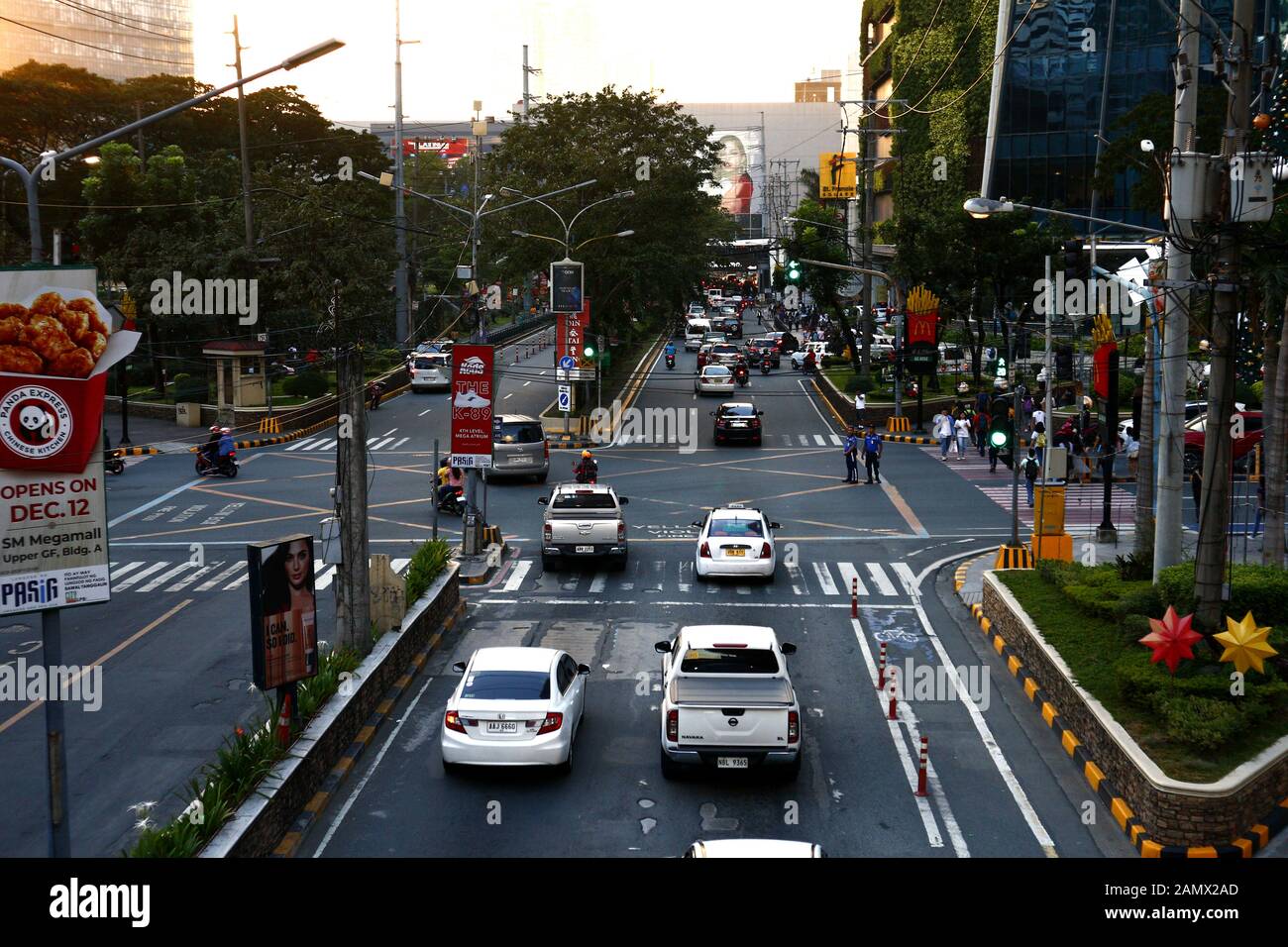 Pasig City, Philippines - January 11, 2020: Vehicles pass at J. Vargas ...