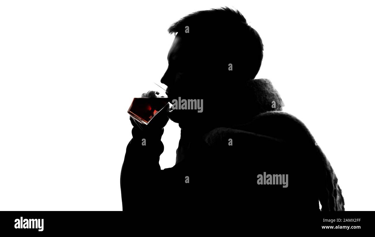 Man drinking tea in shadow hi-res stock photography and images - Alamy
