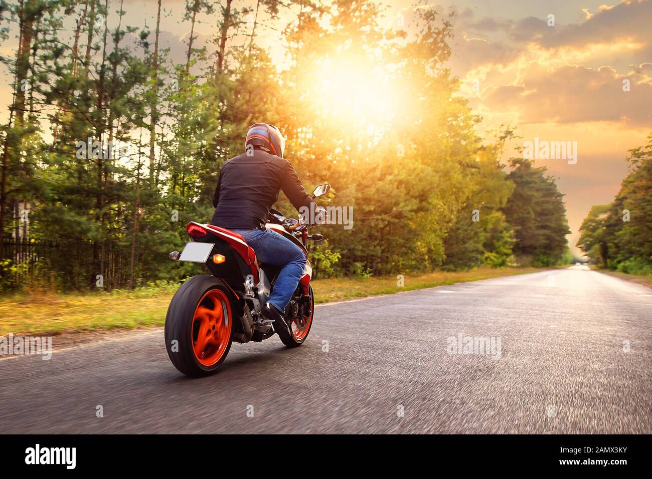 Biker driving motorcycle on highway hi-res stock photography and images ...