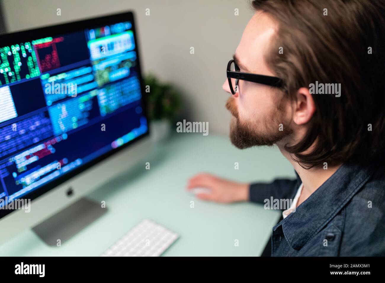 Programmer coding in the computer Stock Photo - Alamy