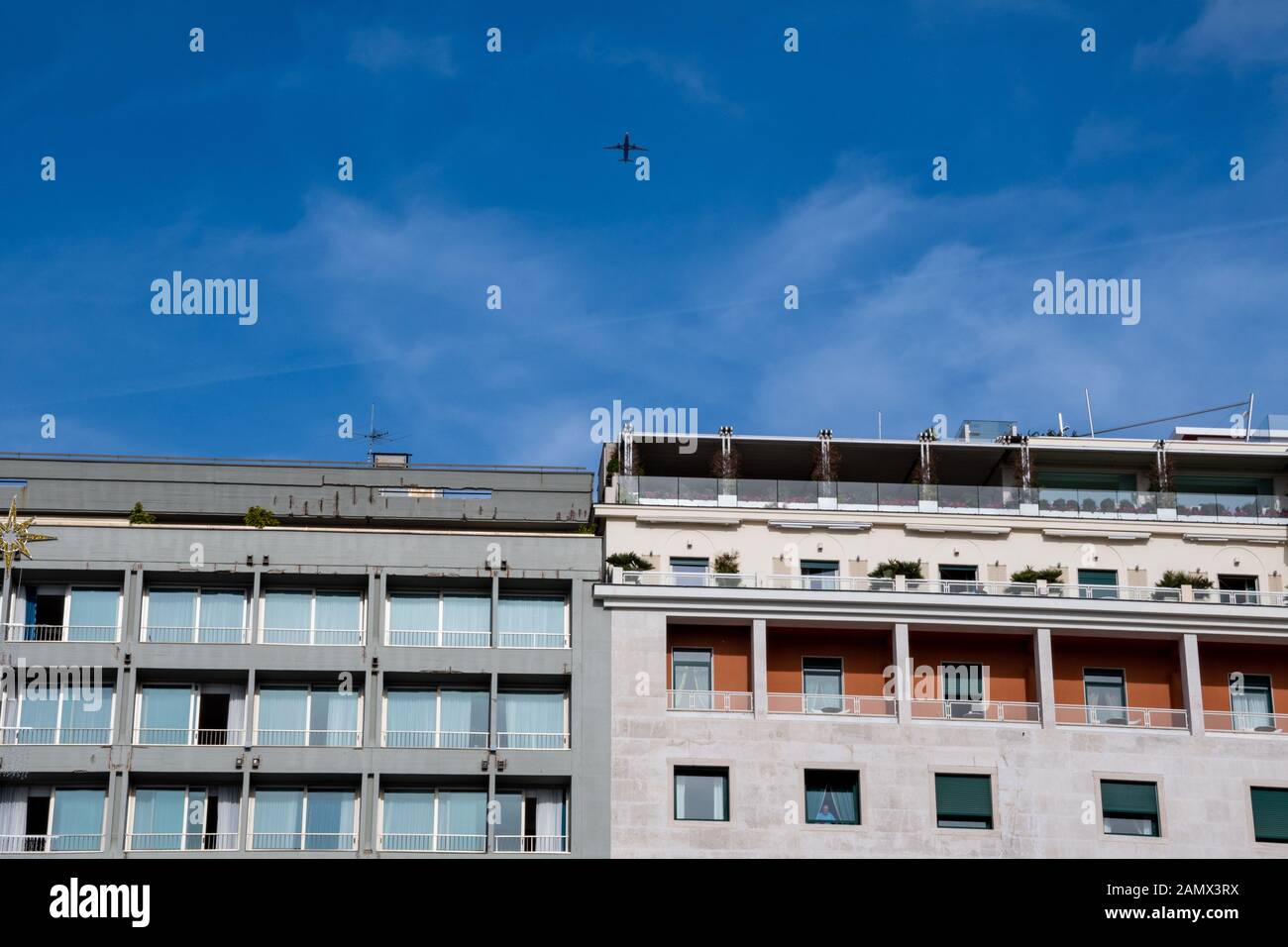 Plane Over Building High Resolution Stock Photography and Images - Alamy