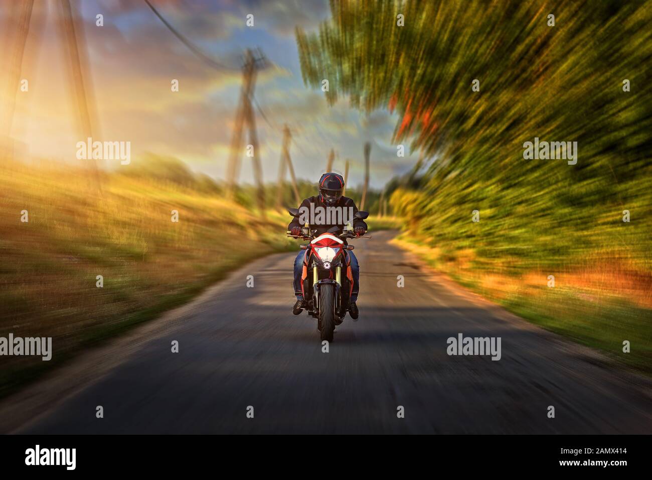 Biker driving motorcycle on highway hi-res stock photography and images ...