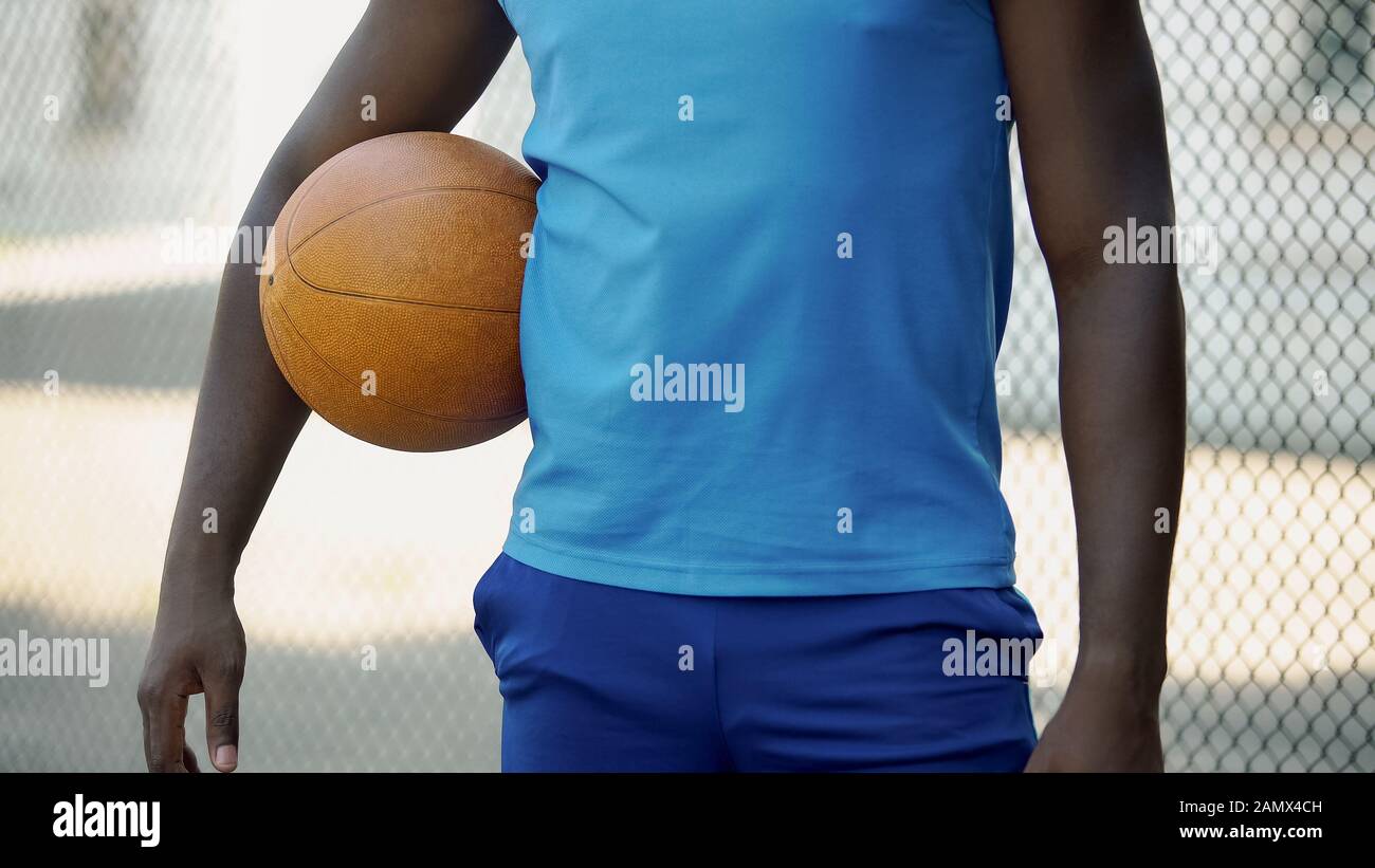 Hands holding ball hi-res stock photography and images - Alamy