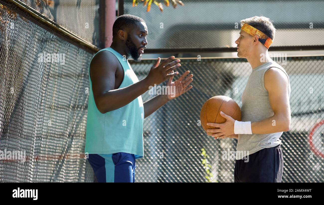 Two men arguing street hi-res stock photography and images - Alamy