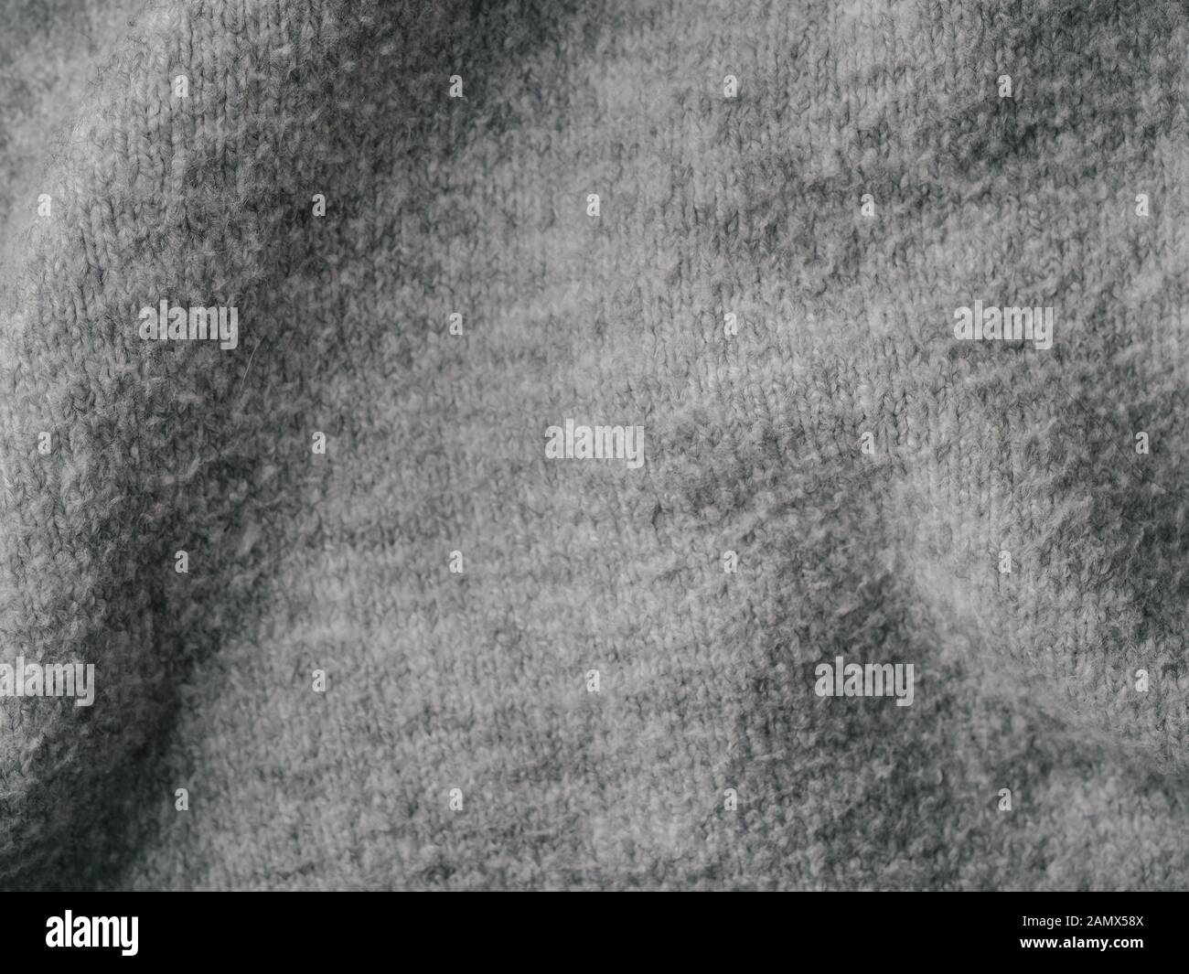 Gray sweater fabric texture. Clothes sweater background with folds ...