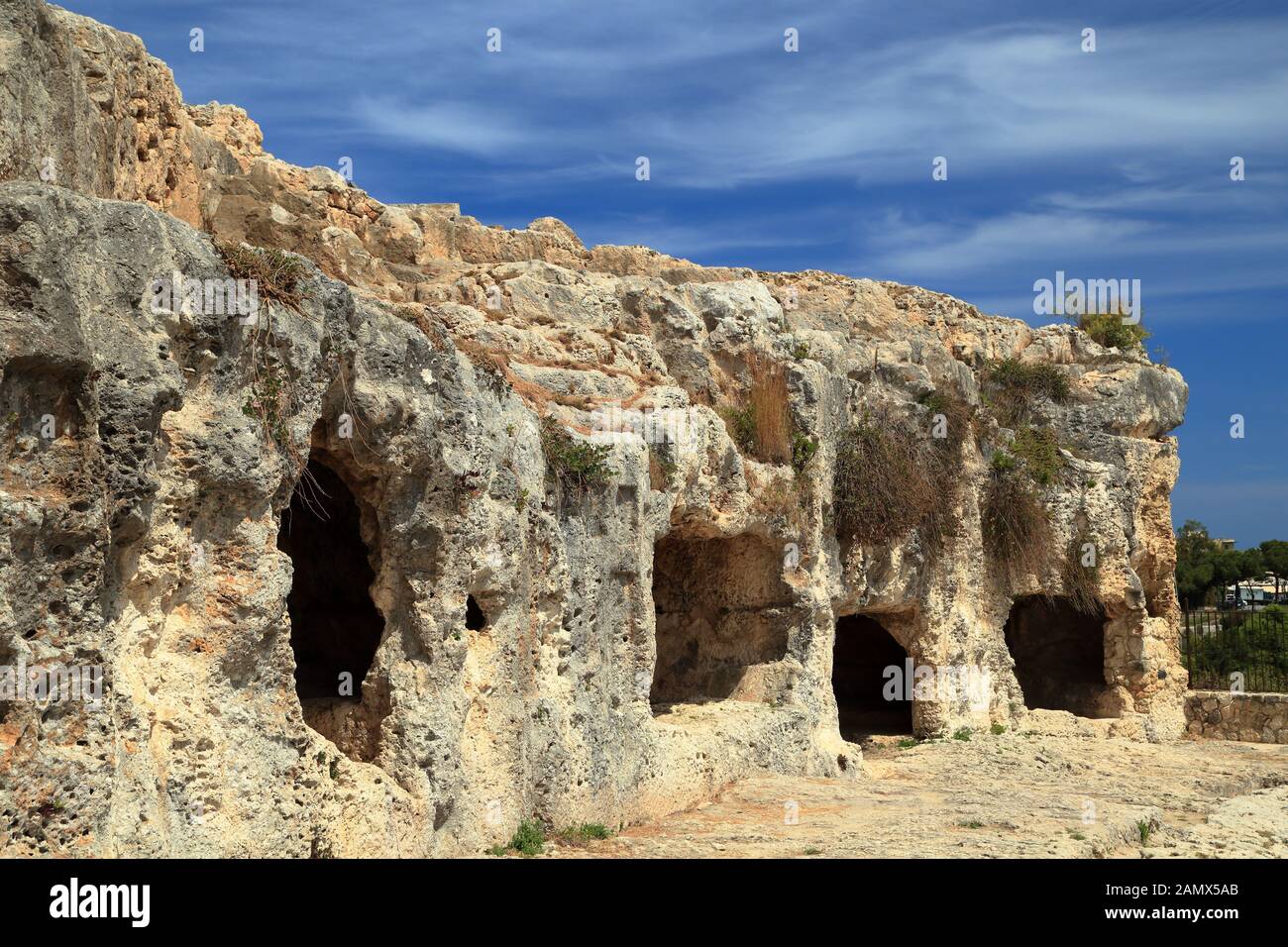 Niches in the limestone of Greek Theatre of Syracuse Stock Photo - Alamy