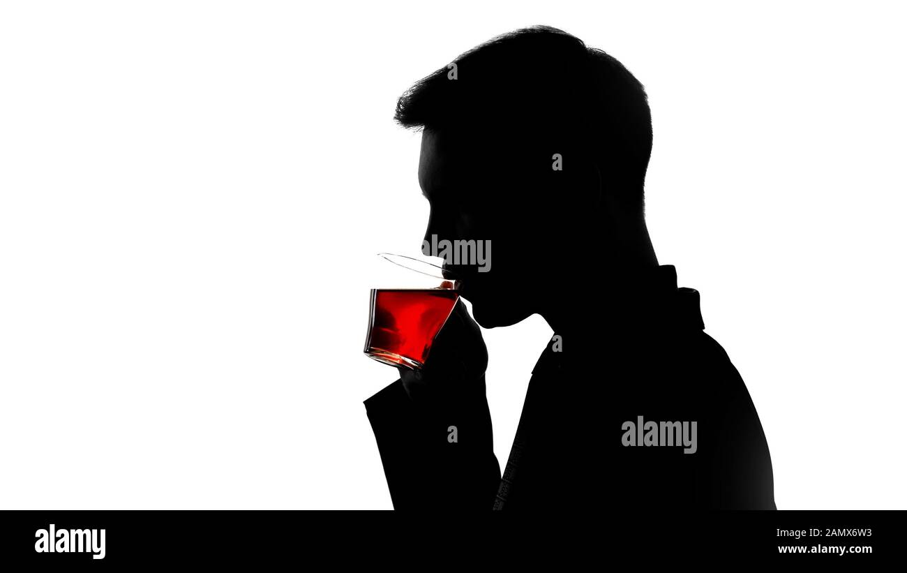 Man silhouette drinking tea, recreation after work, pH balance restore ...