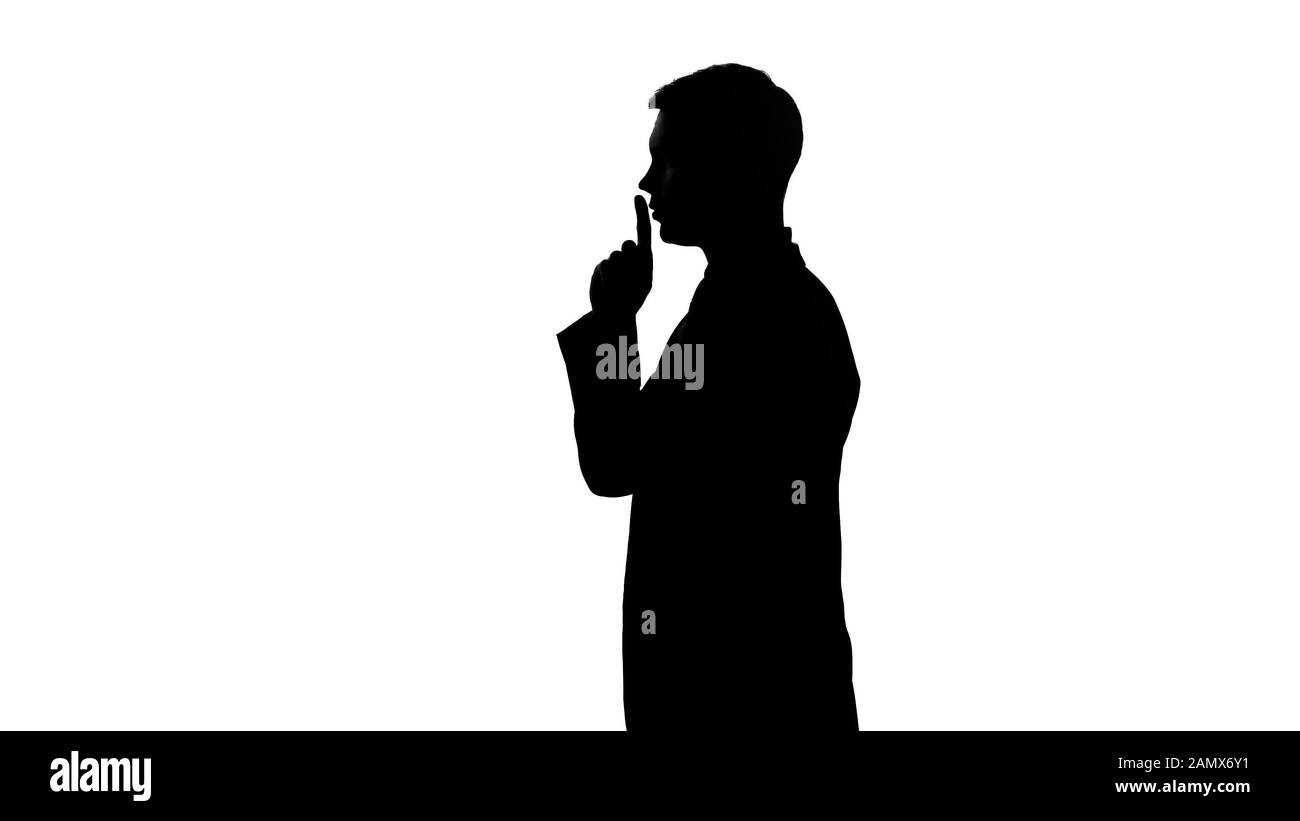 Man mystery silhouette silence gesture hi-res stock photography and ...