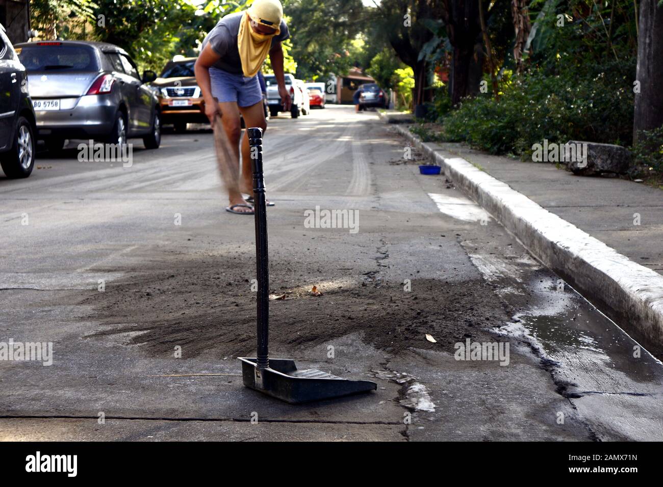 Antipolo City, Philippines - January 13, 2020: Residents clean the ...