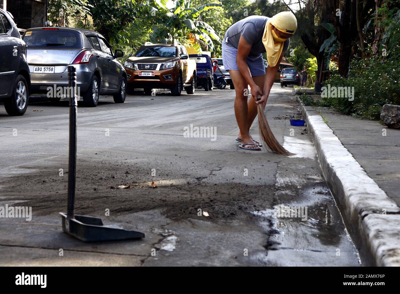Antipolo City, Philippines - January 13, 2020: Residents clean the ...