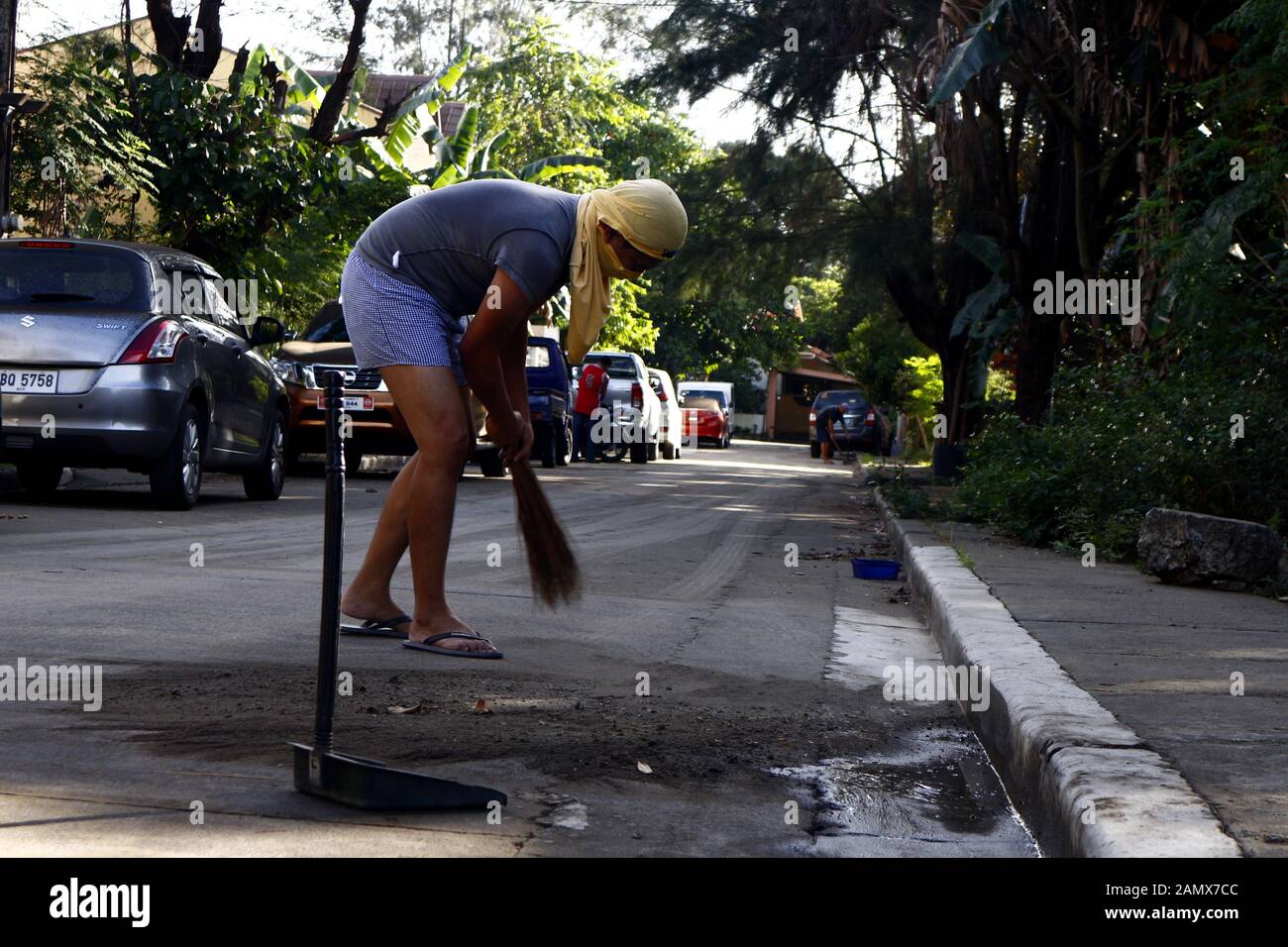 Antipolo City, Philippines - January 13, 2020: Residents clean the ...