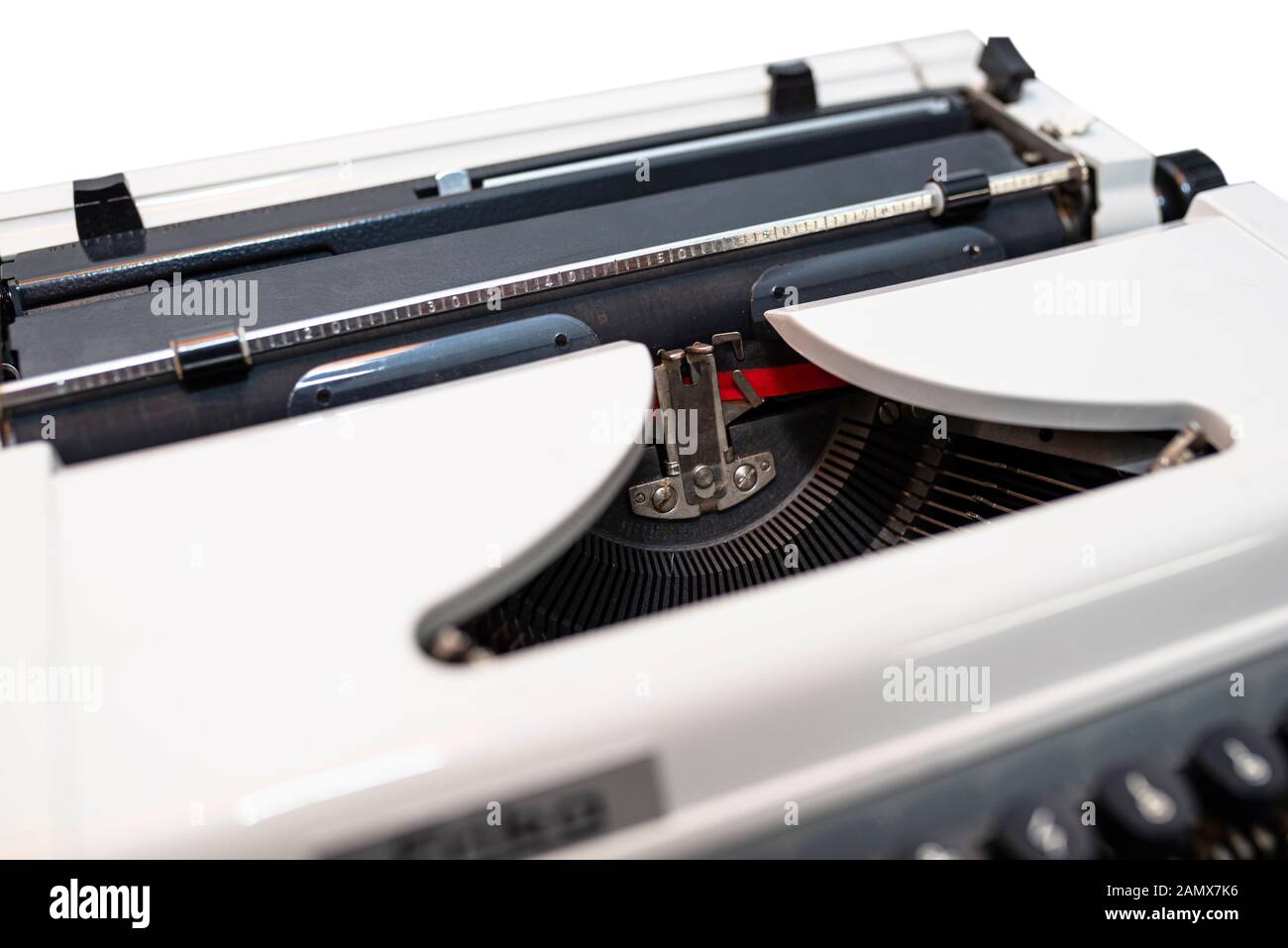 Classic, manual typewriter in white with a German keyboard layout ...