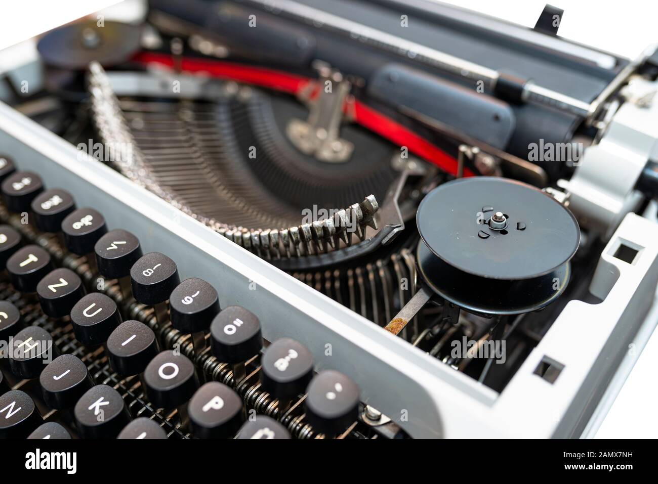 Classic, manual typewriter in white with a German keyboard layout ...
