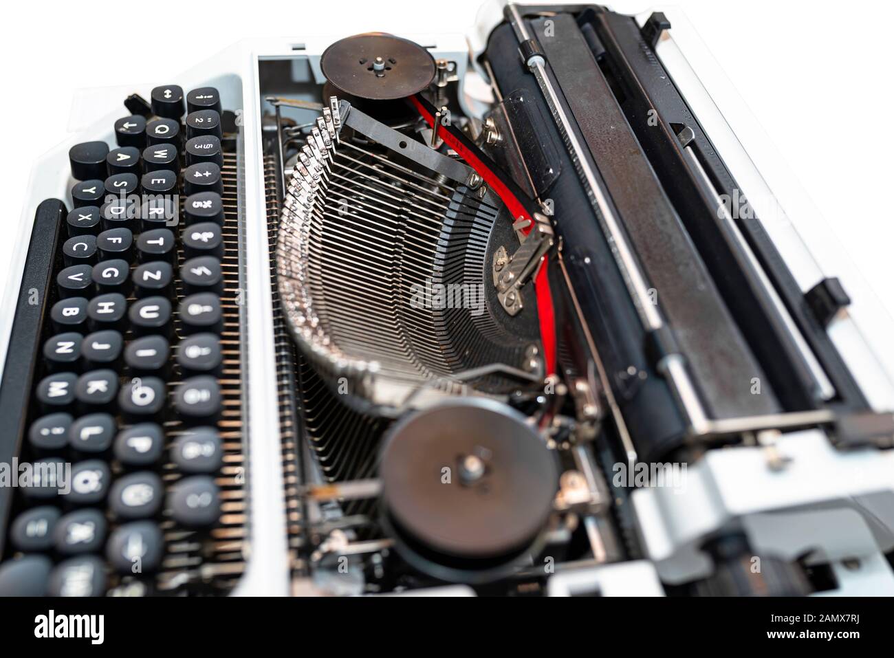 Classic, manual typewriter in white with a German keyboard layout ...