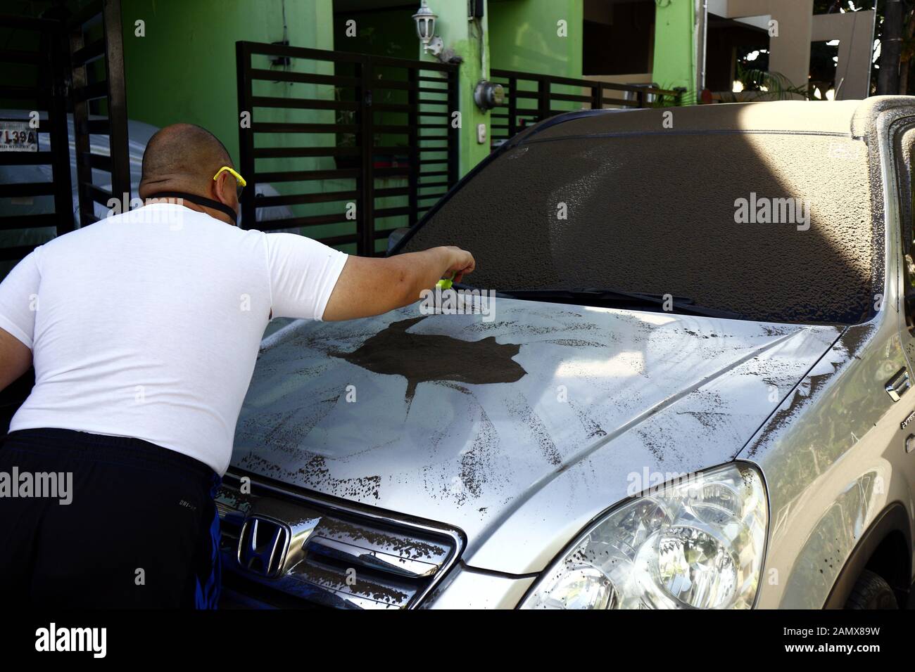 Antipolo City, Philippines - January 13, 2020: Residents clean their ...