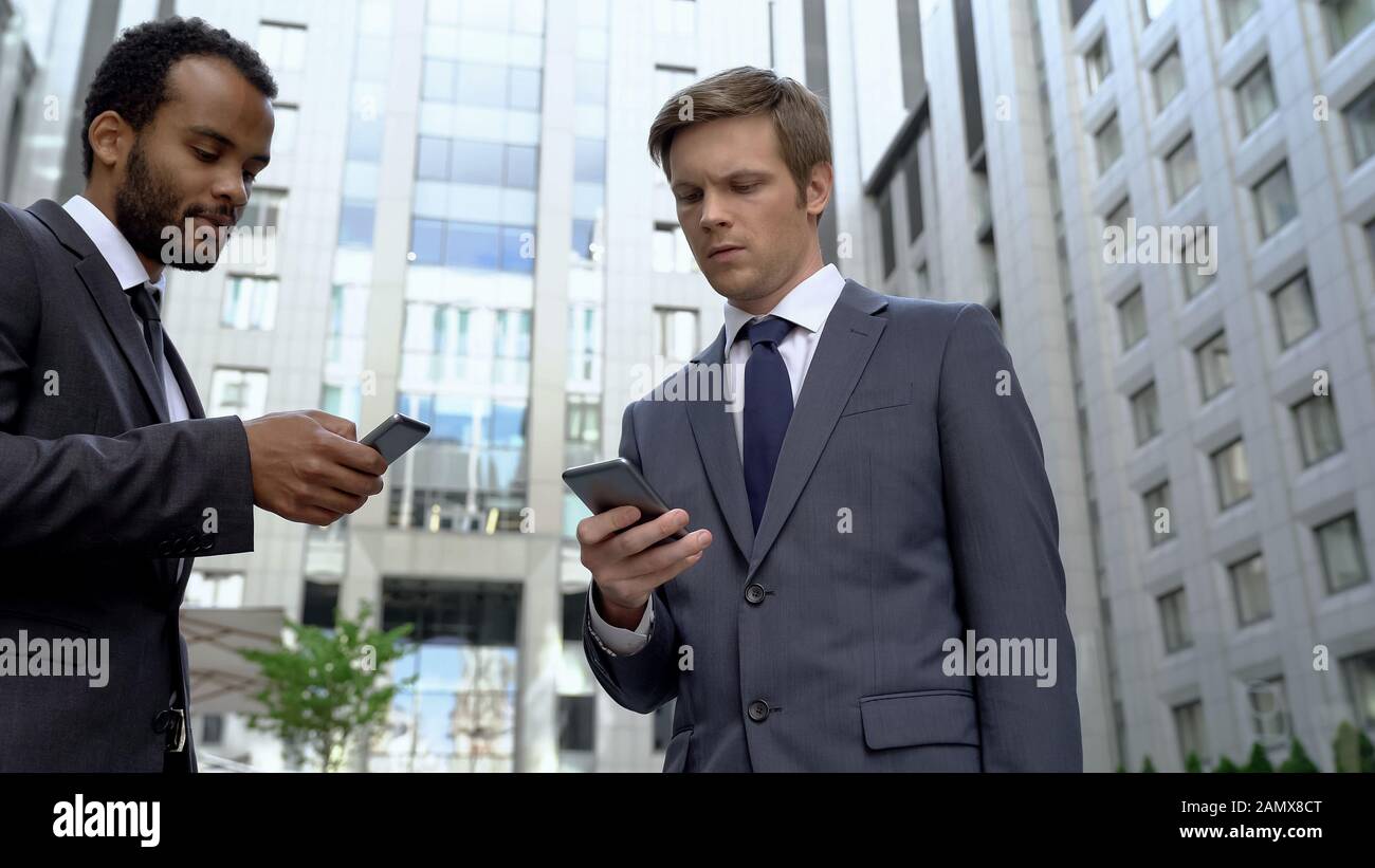 Business people using financial apps hi-res stock photography and ...