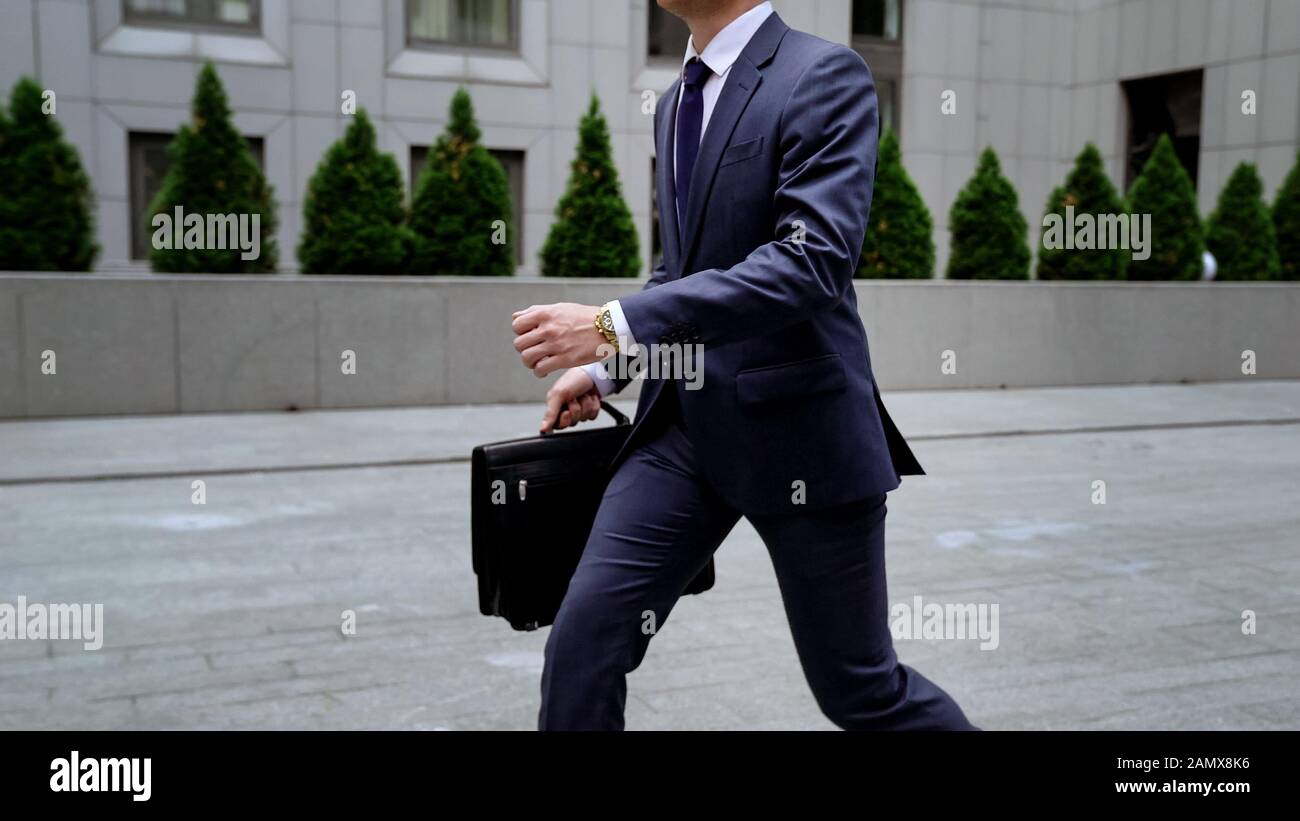 Hurrying into office building hi-res stock photography and images - Alamy