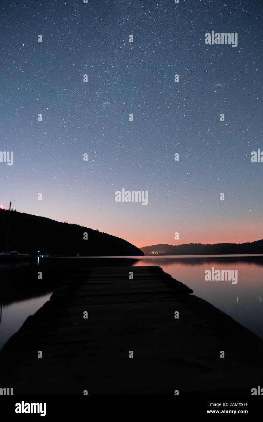 Night sky over the lake Stock Photo - Alamy