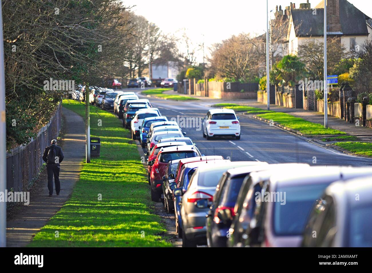 Long street with cars in winter hi-res stock photography and images - Alamy