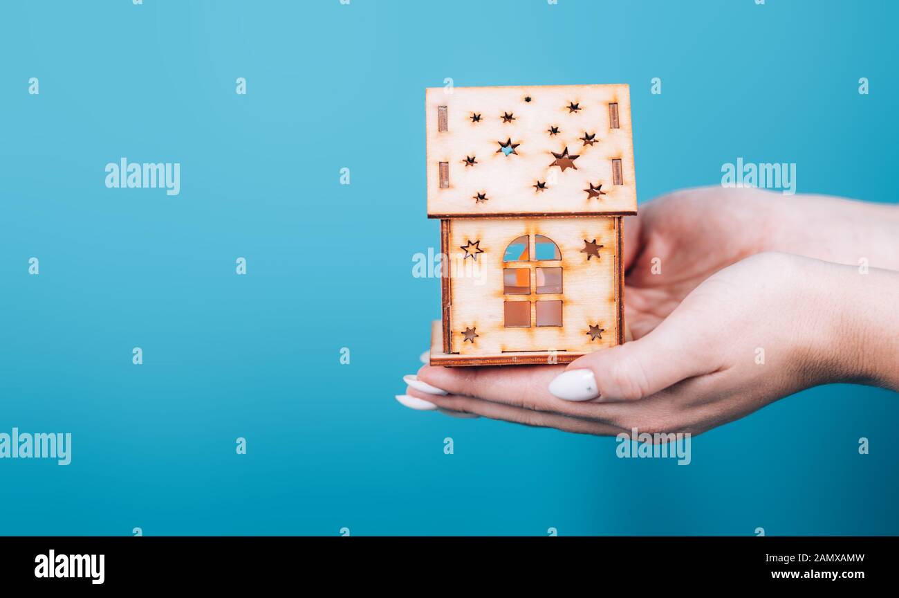 closeup picture of woman hands holding house Stock Photo - Alamy
