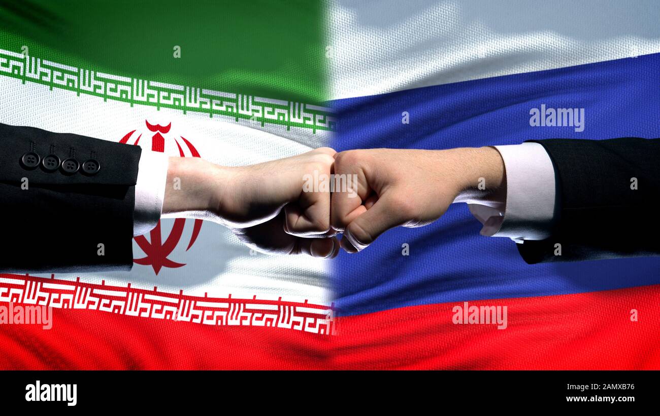 Iran vs Russia conflict, international relations, fists on flag ...