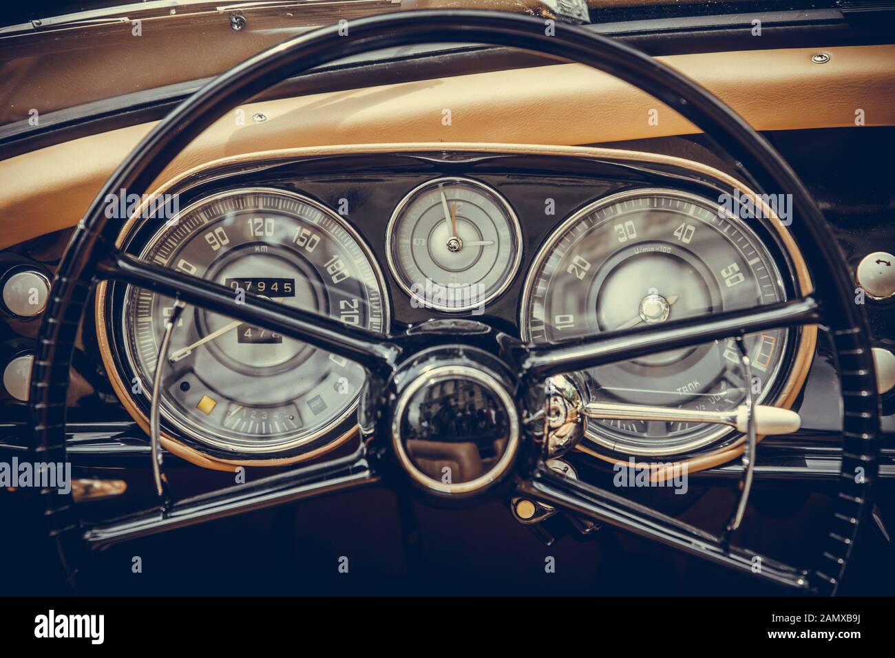 Color close up shot of a tachometer, a speedometer, a clock and other ...