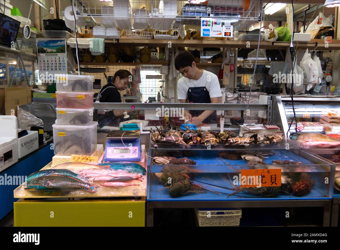 Japanese man working at Makishi Public Market in Naha, Okinawa, Japan ...
