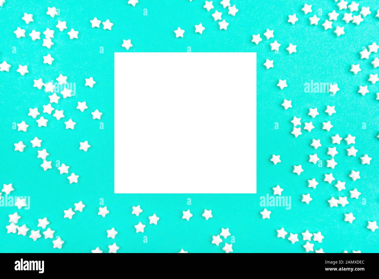 Little white stars on mint background Stock Photo - Alamy