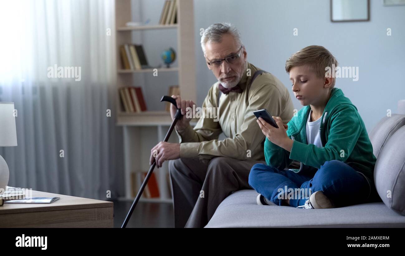 Child cell phone obsessed hi-res stock photography and images - Alamy
