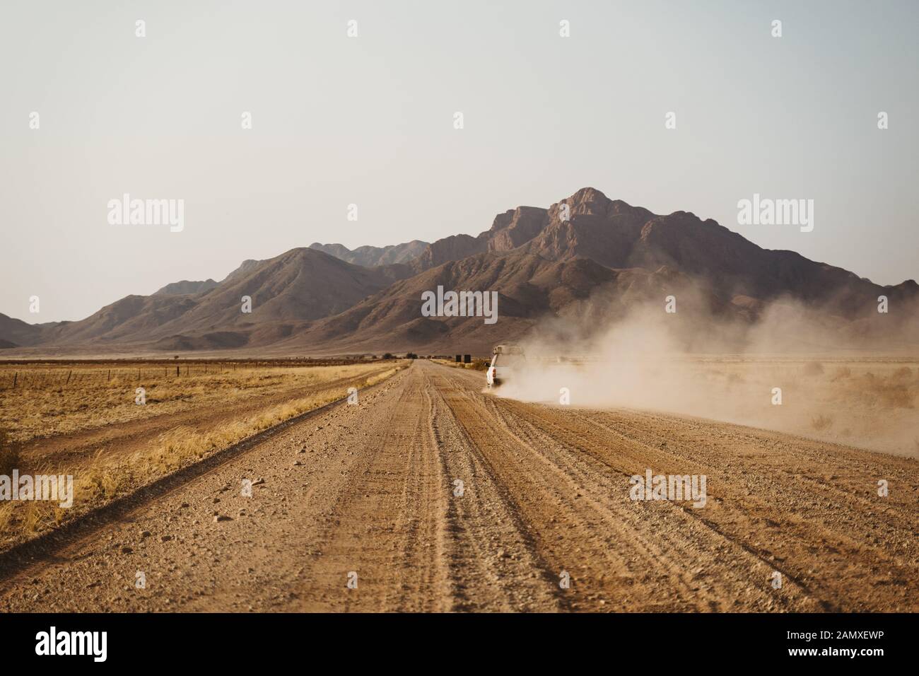 4x4 through heat haze travelling on an unsealed desert sand road Stock ...