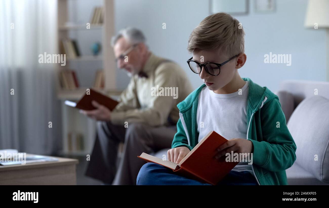 Smart kid in eyeglasses and old man reading books, education for ...