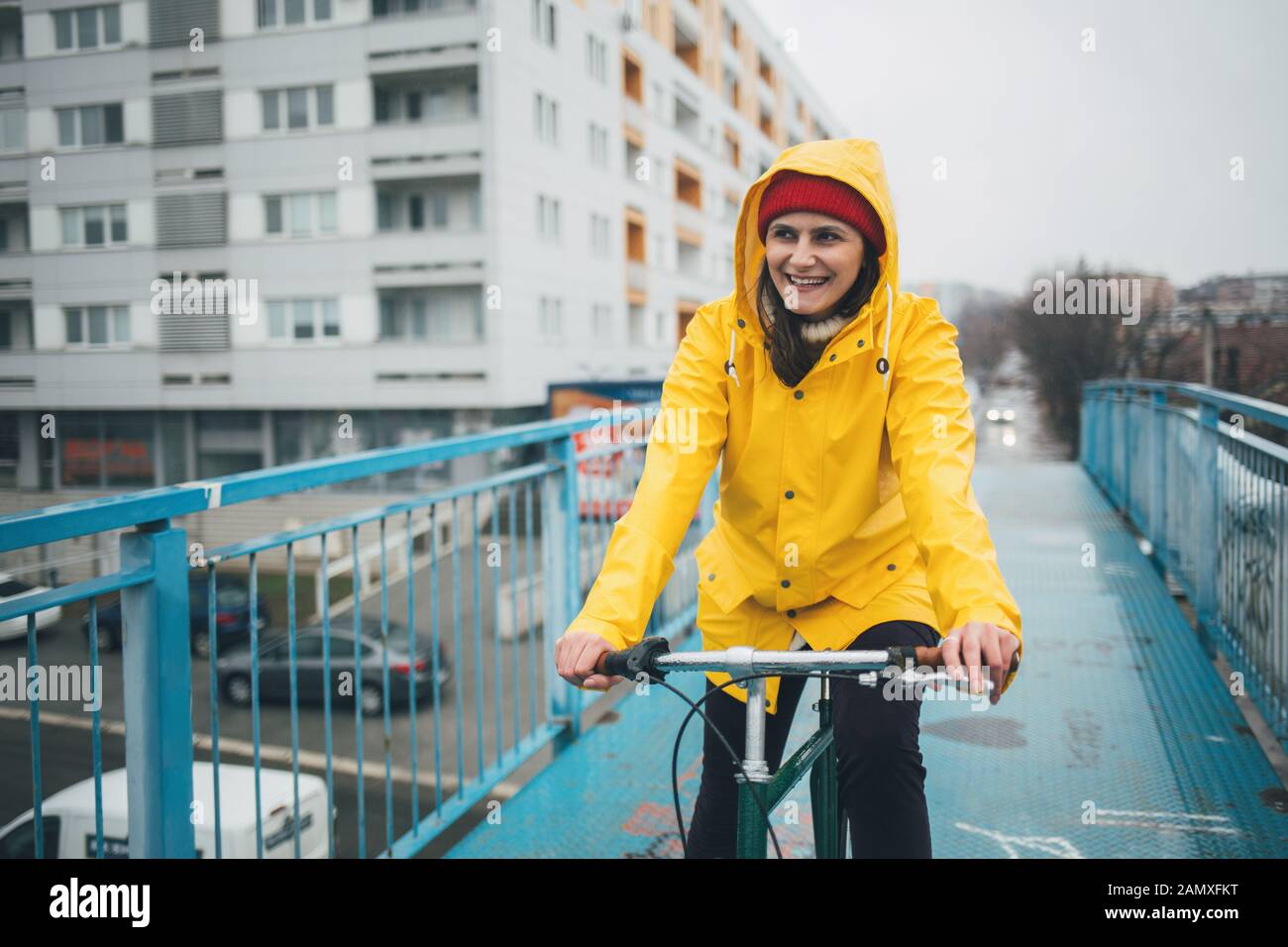 Cycling rain woman hi-res stock photography and images - Alamy