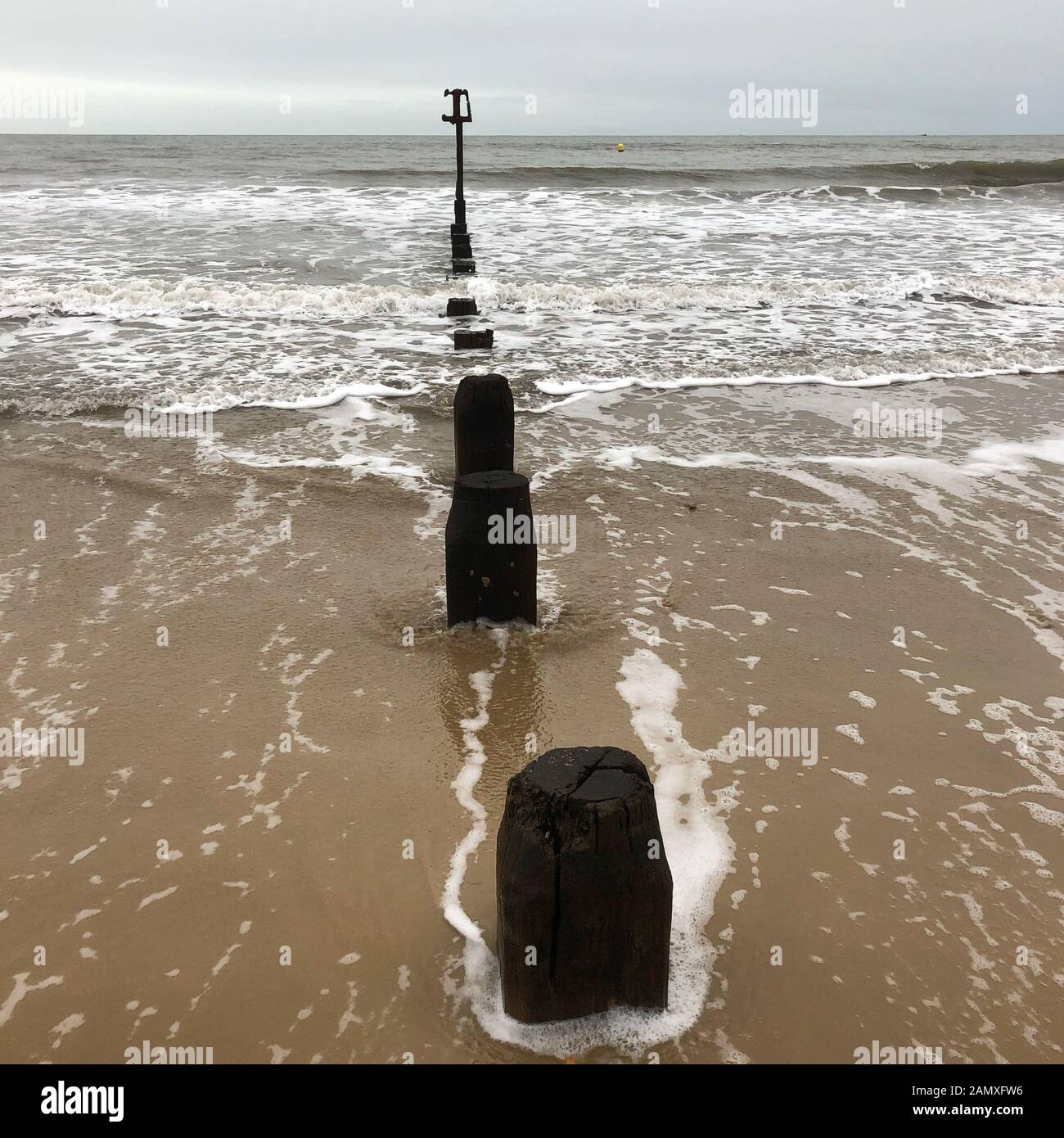 The blue flaged beach of Sandbanks, showing how the sea and rain during ...