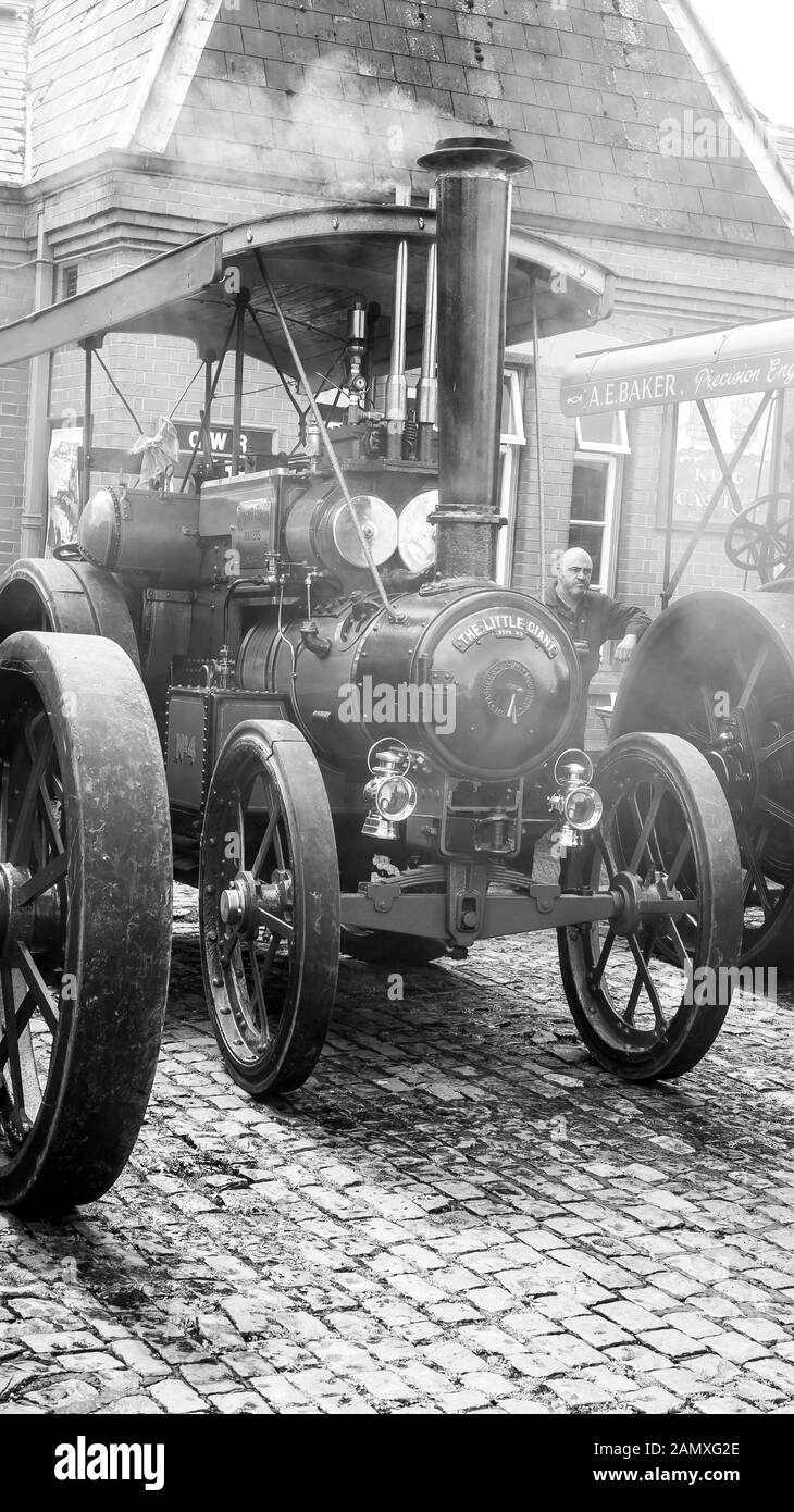 Black and white front view close up of vintage UK steam traction engine ...
