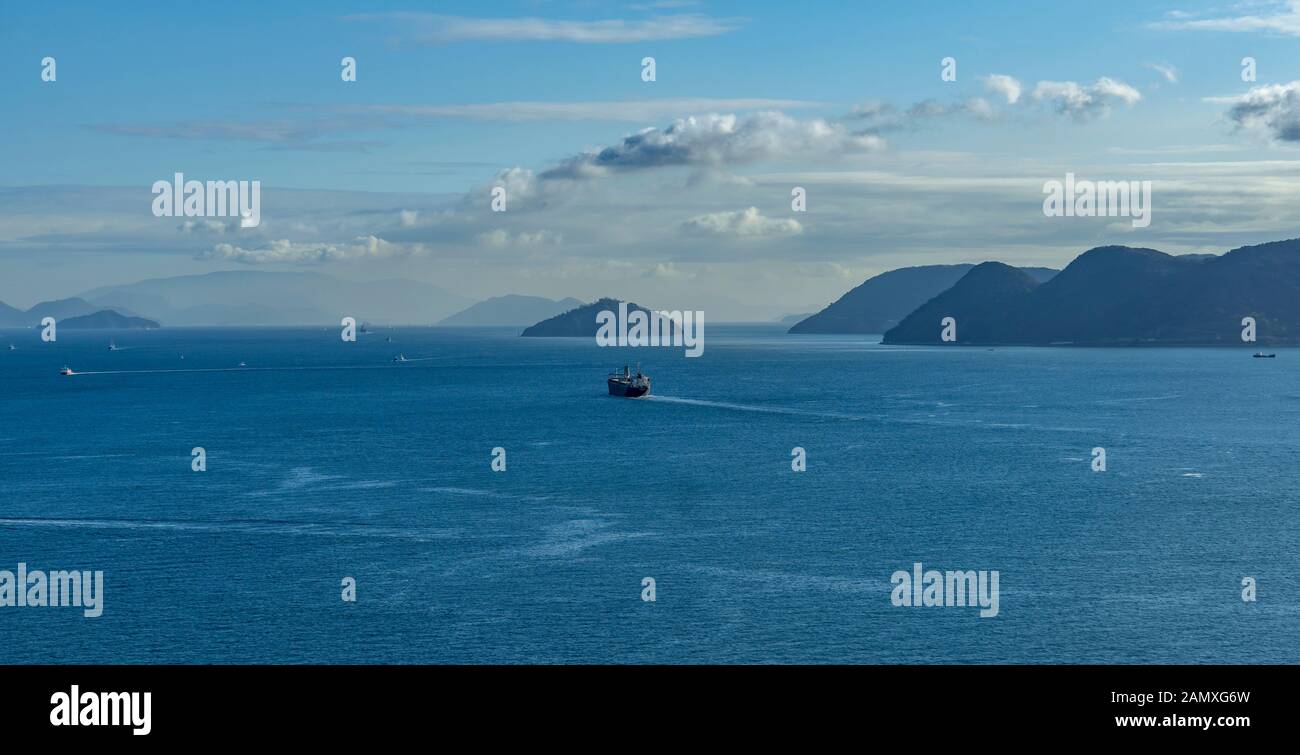 Ships on the Seto Inland Sea, seen from a train crossing the Great Seto ...