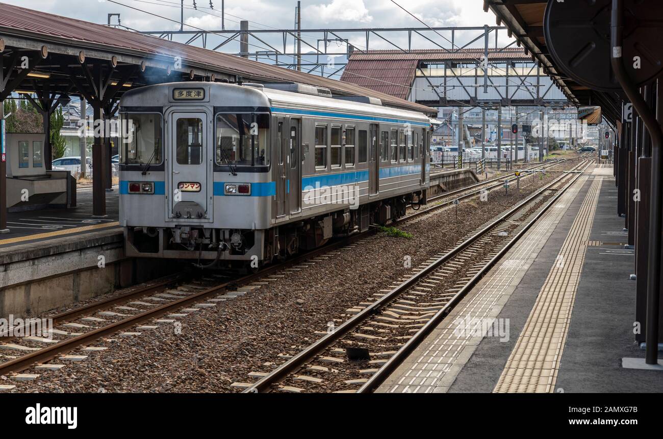 A JR Shikoku local One Man train on the Dosan Line at Kotohira Station ...