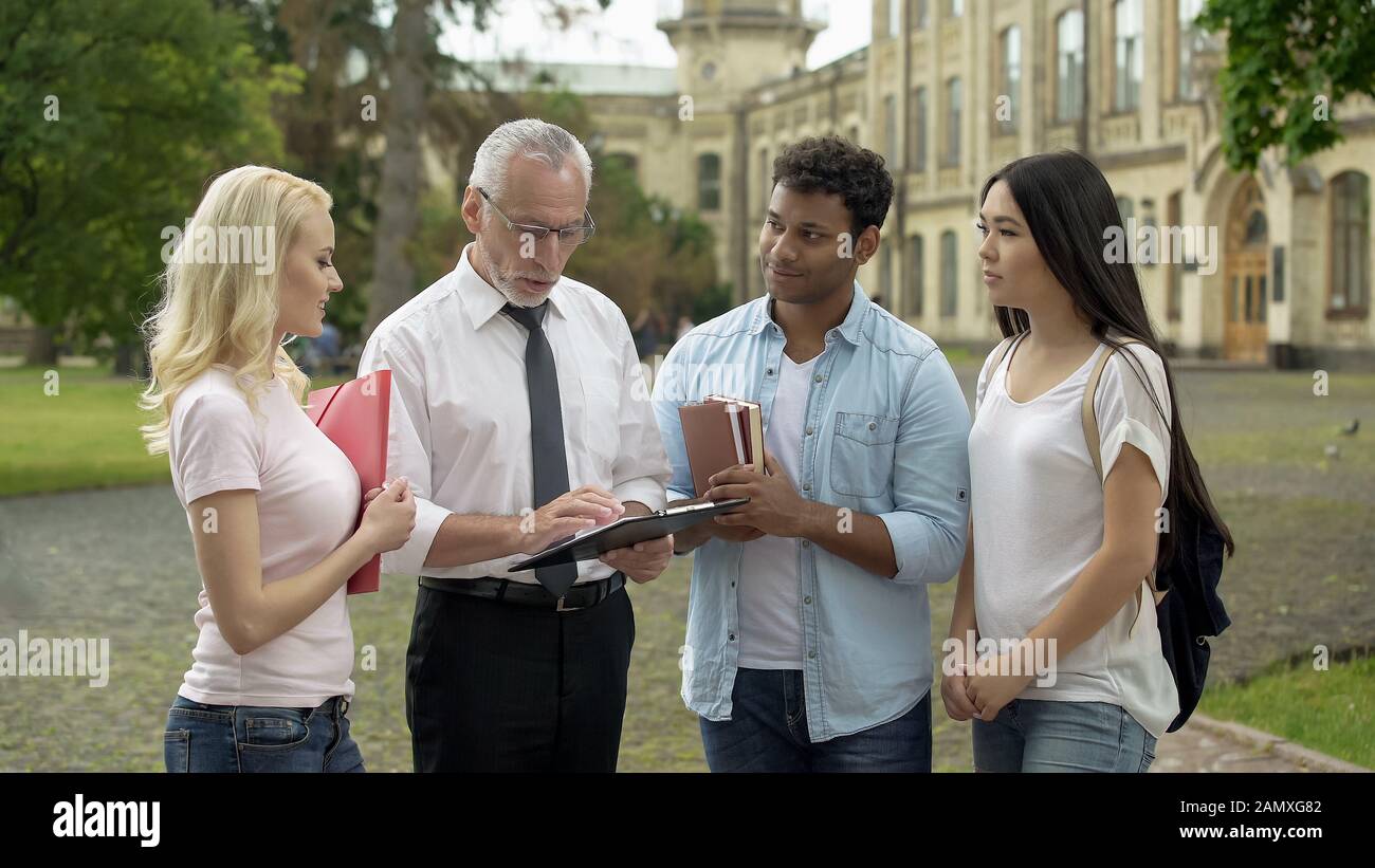 Giving assignments hi-res stock photography and images - Alamy