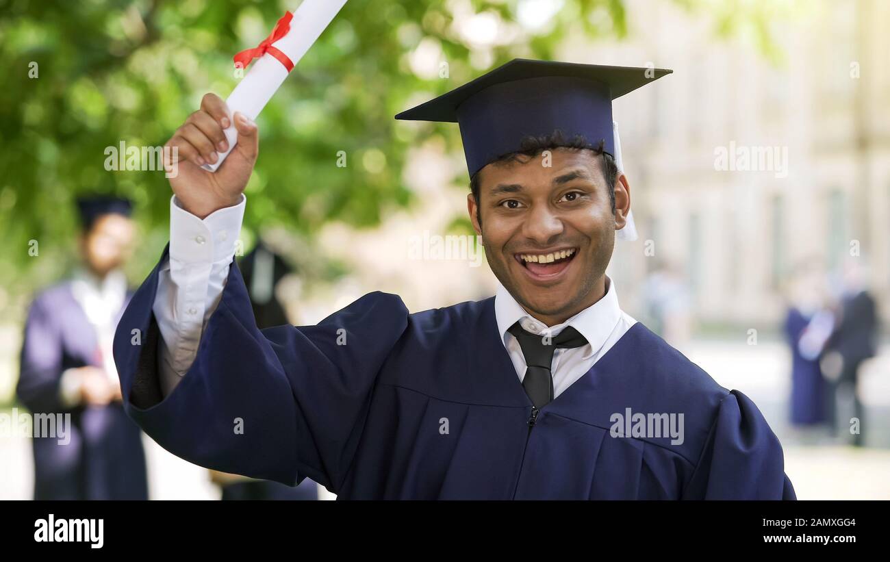 Man showing degree certificate hi-res stock photography and images - Alamy